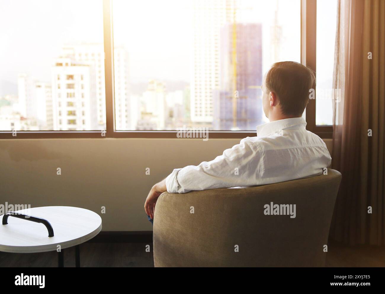 Lazy man in chair hi-res stock photography and images - Alamy
