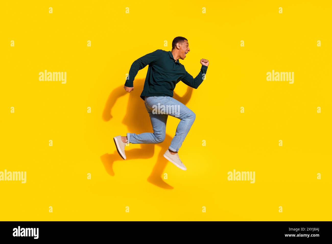 Full size photo of handsome young guy running fast dressed stylish ...