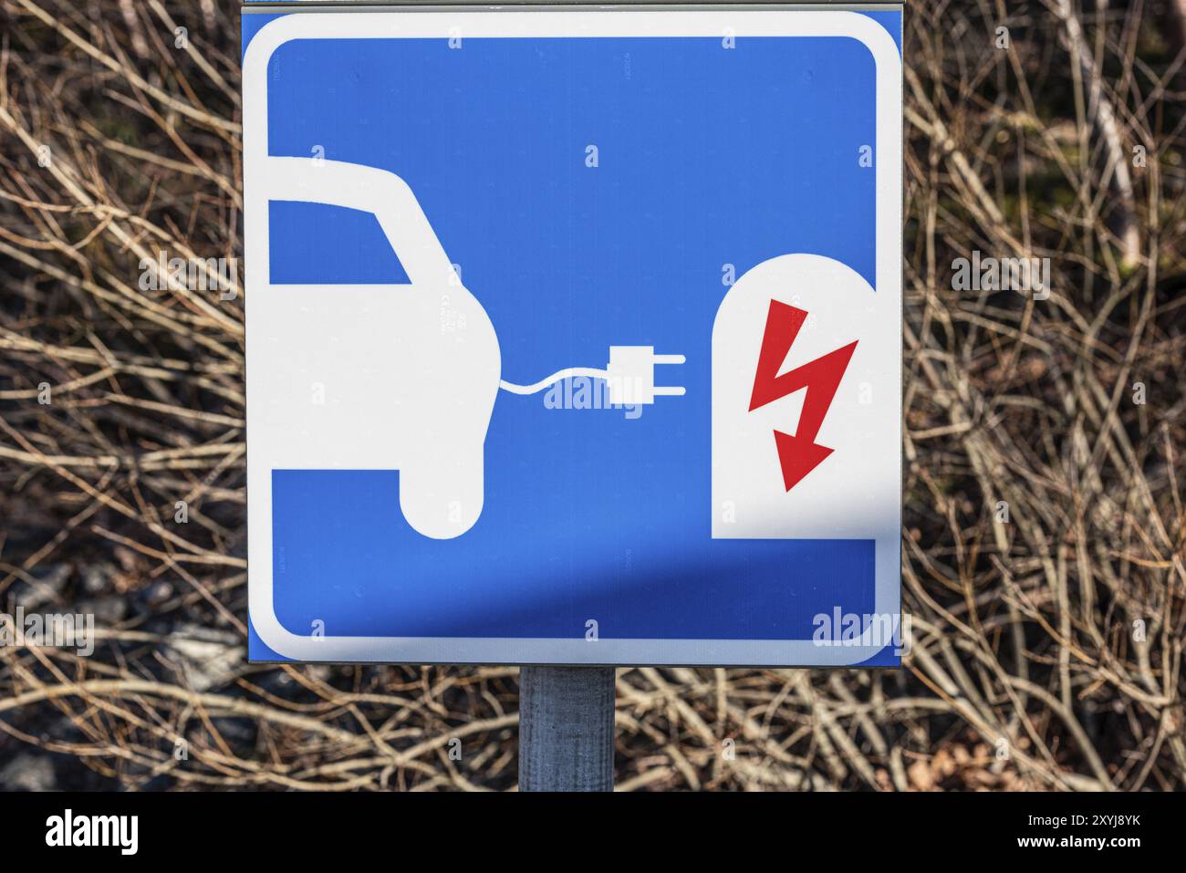 Electric car charger available sign Stock Photo - Alamy