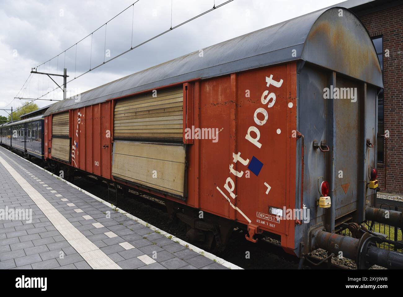 Utrecht, Netherlands. May 17, 2023. An old mail wagon at the railroad ...