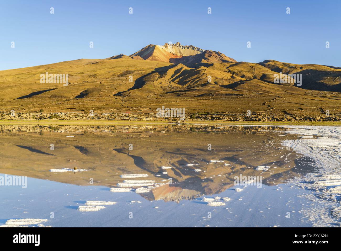 Dormant volcano and Coqueza Village at Solar De Uyuni in Bolivia Stock ...