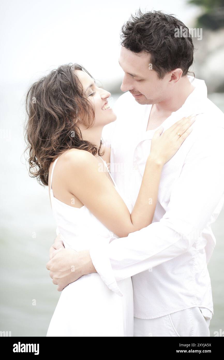 Happy smiling newly married attractive couple Stock Photo - Alamy