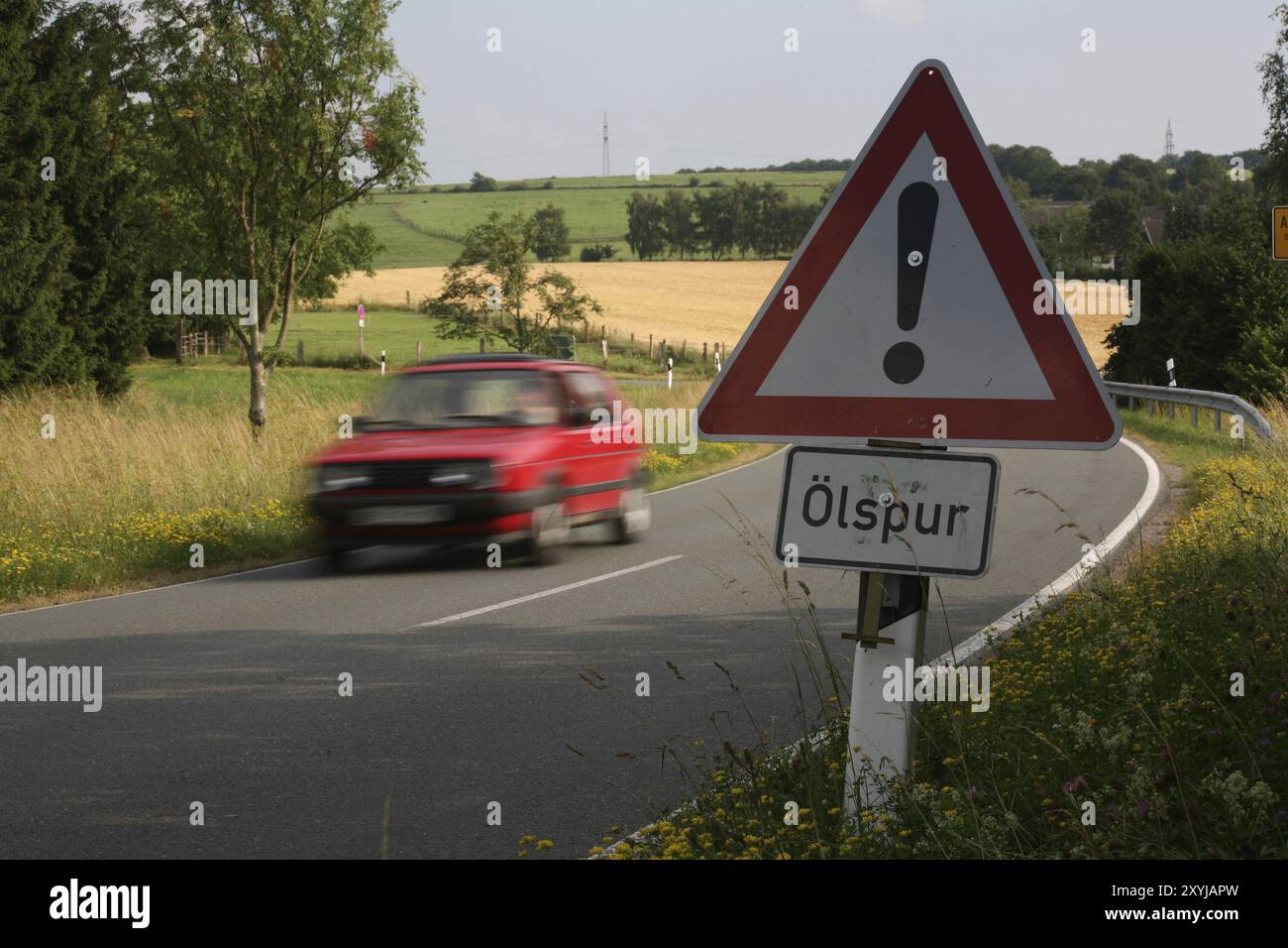 Warning sign at the scene of an accident Stock Photo - Alamy
