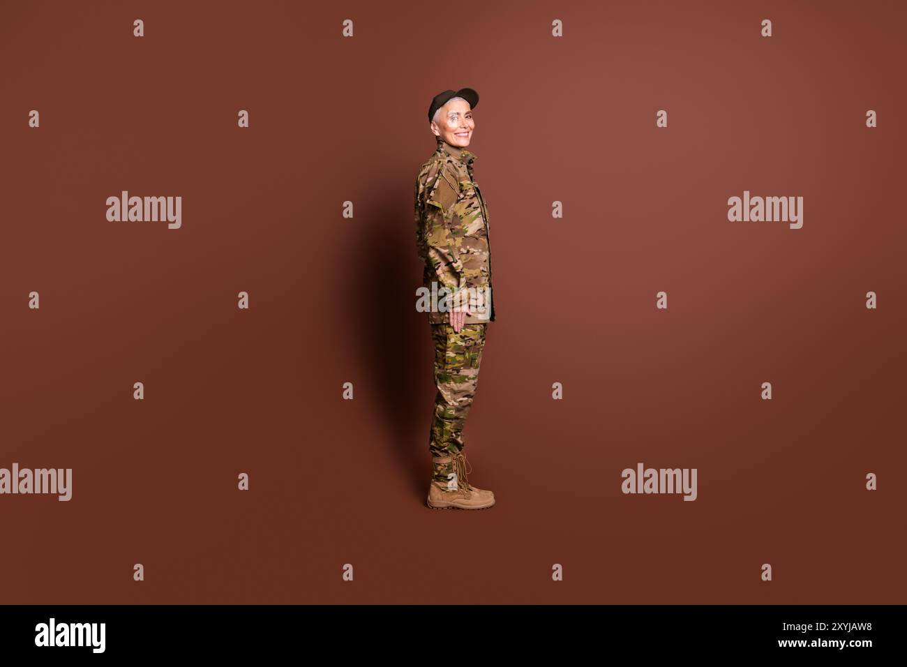 Full body photo of attractive mature woman army soldier stand profile ...