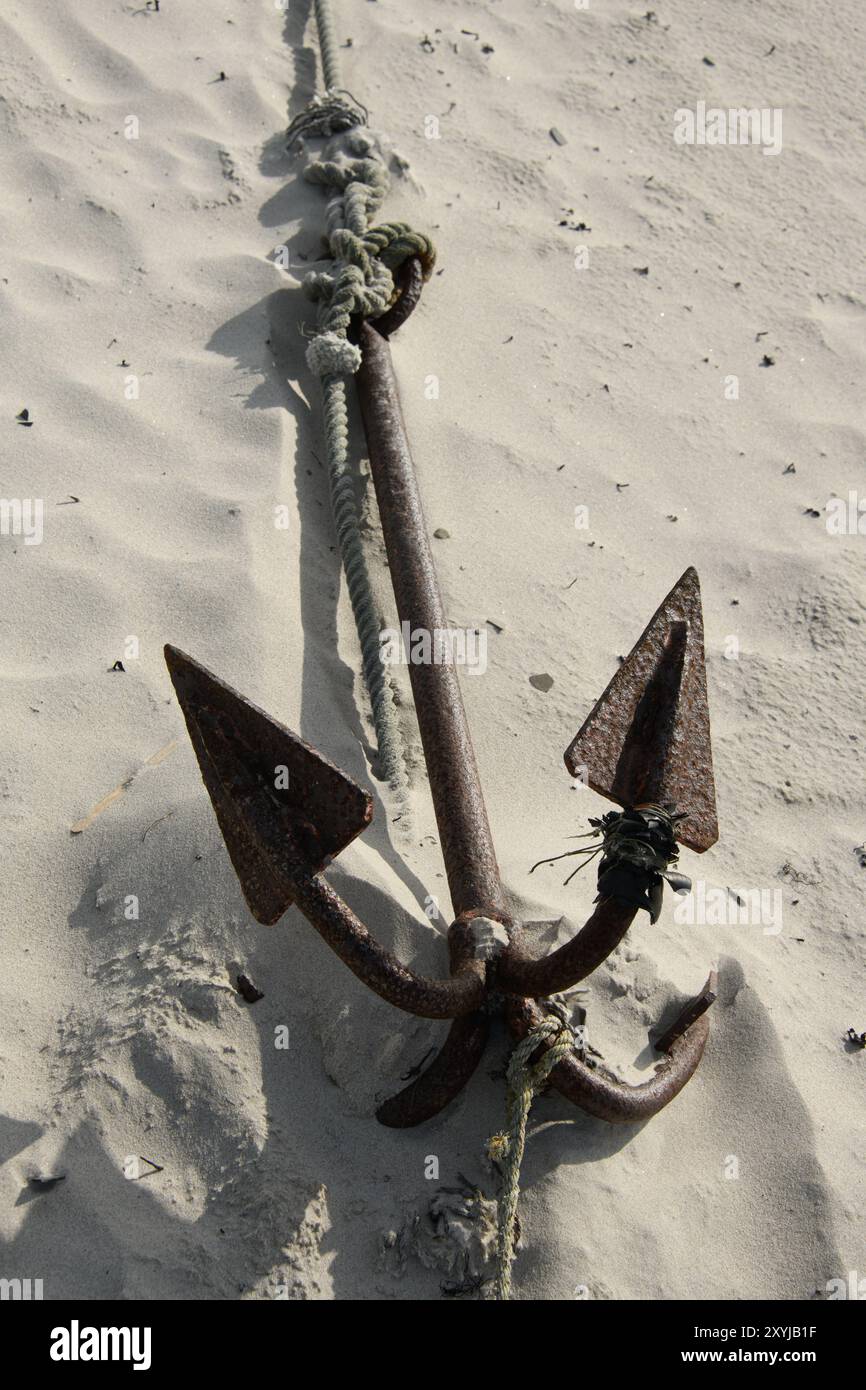 Boat and Anchor on Sandy Beach Stock Photo - Alamy
