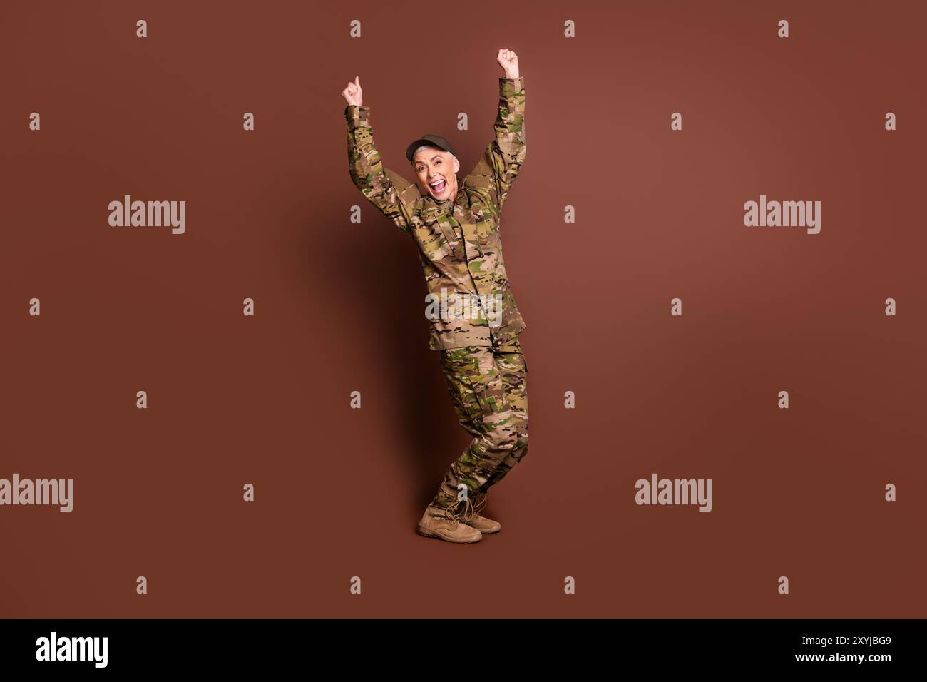 Full body photo of attractive mature woman army soldier winning raise ...