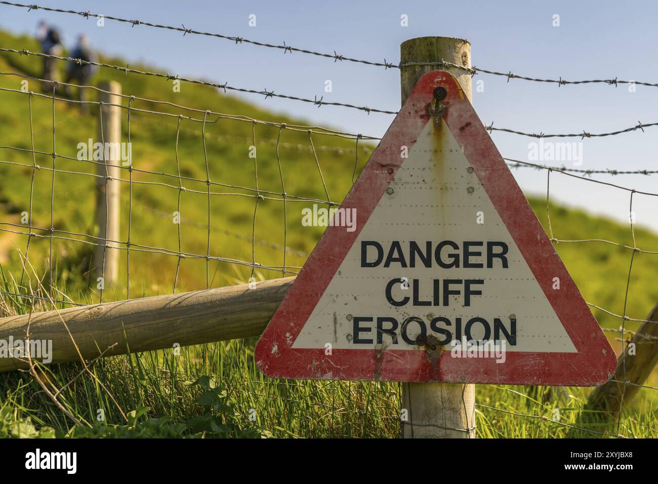 Sign: Danger cliff erosion, seen at Worbarrow Bay, Jurassic Coast ...