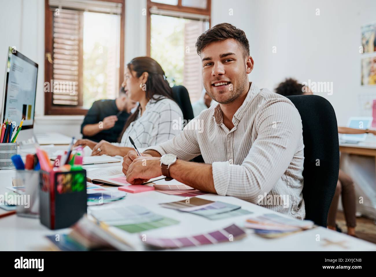 Portrait, creative and businessman in office with planning for art ...