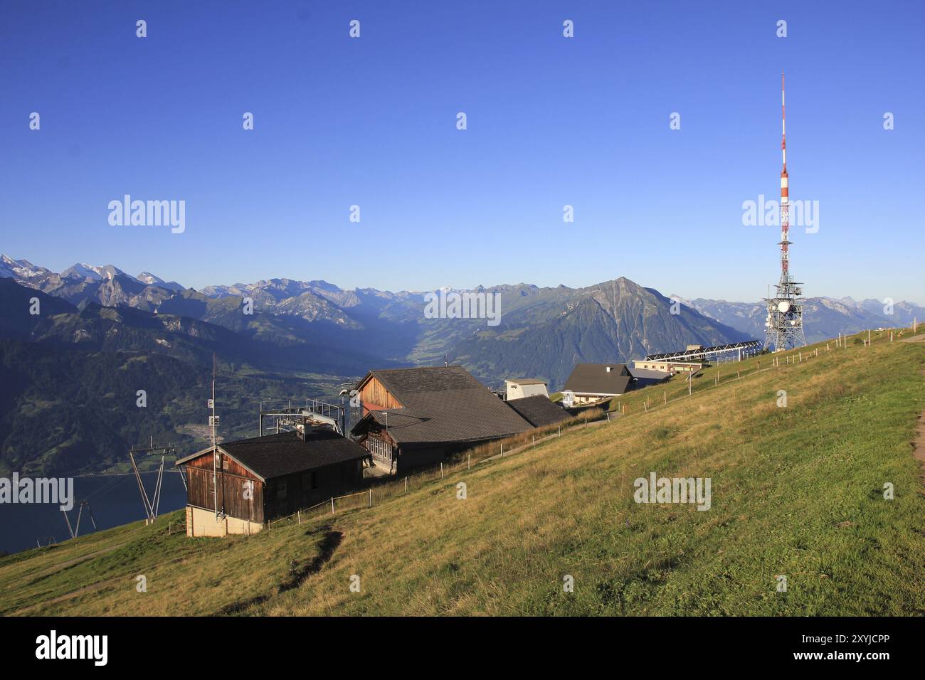 Popular travel destination Mt Niederhorn in summer. Summit station of a ...