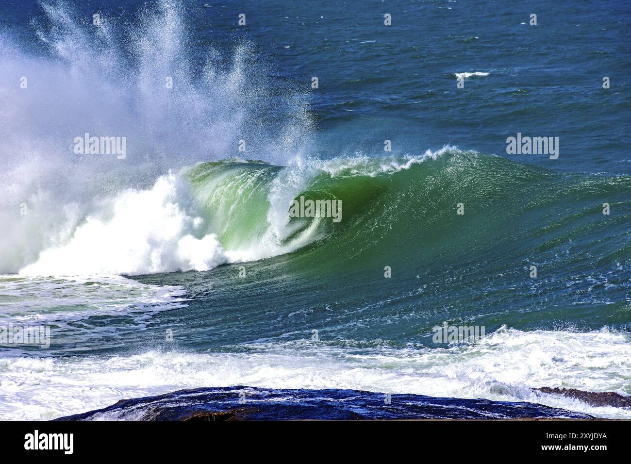 Big, dangerous waves during tropical storm in the green and blue waters ...