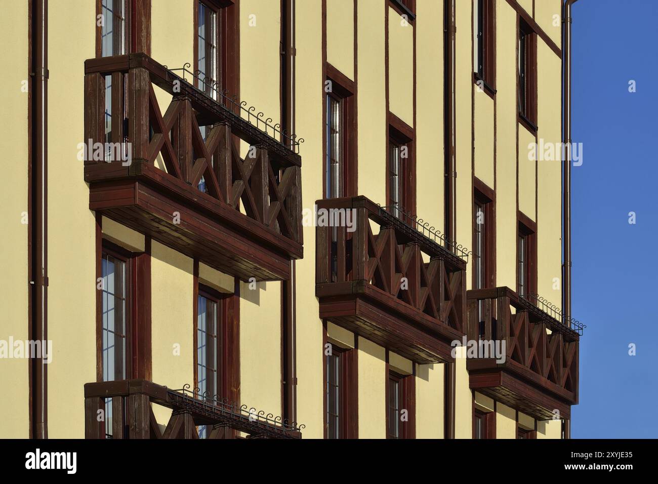 Beautiful wooden french balconies on the wall of the new House Stock ...