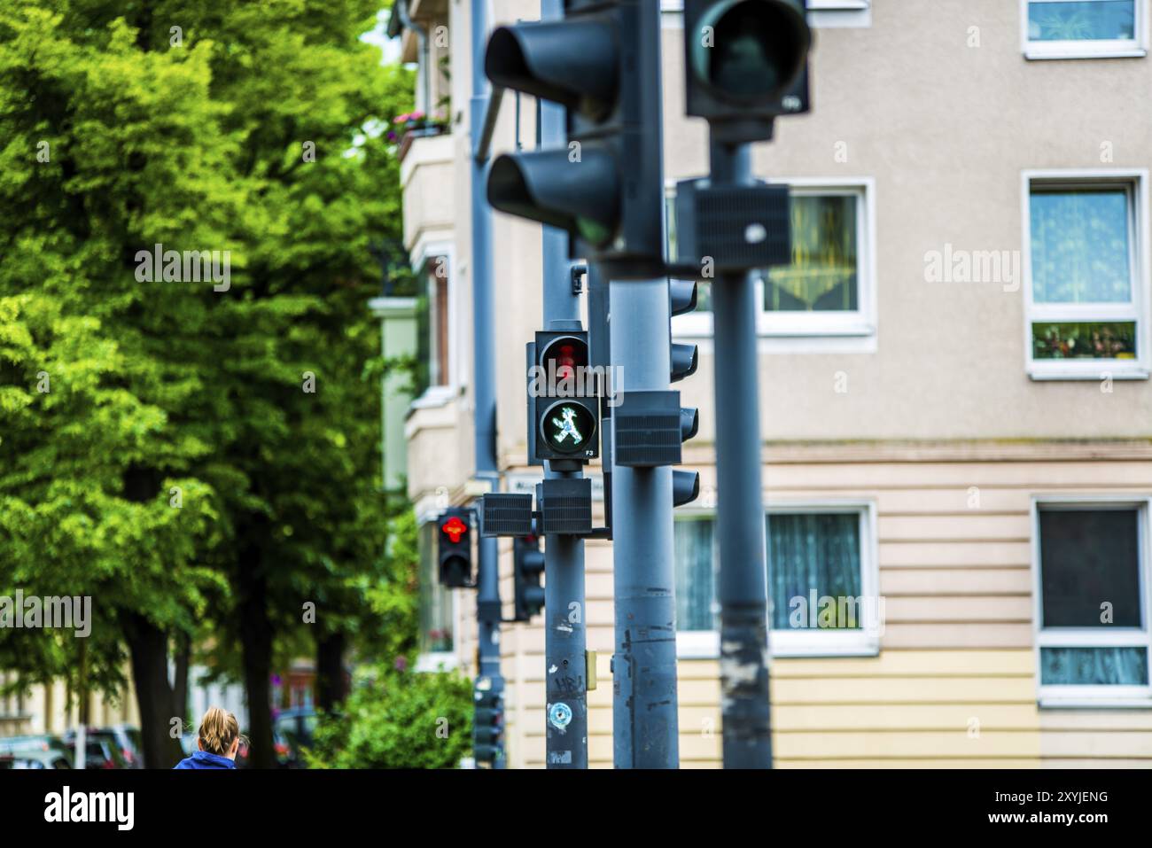 Traffic lights with the green man in Berlin Stock Photo - Alamy
