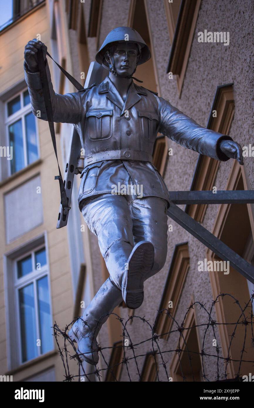 Metal soldier sculpture on a house facade in Brunnenstrasse Stock Photo ...