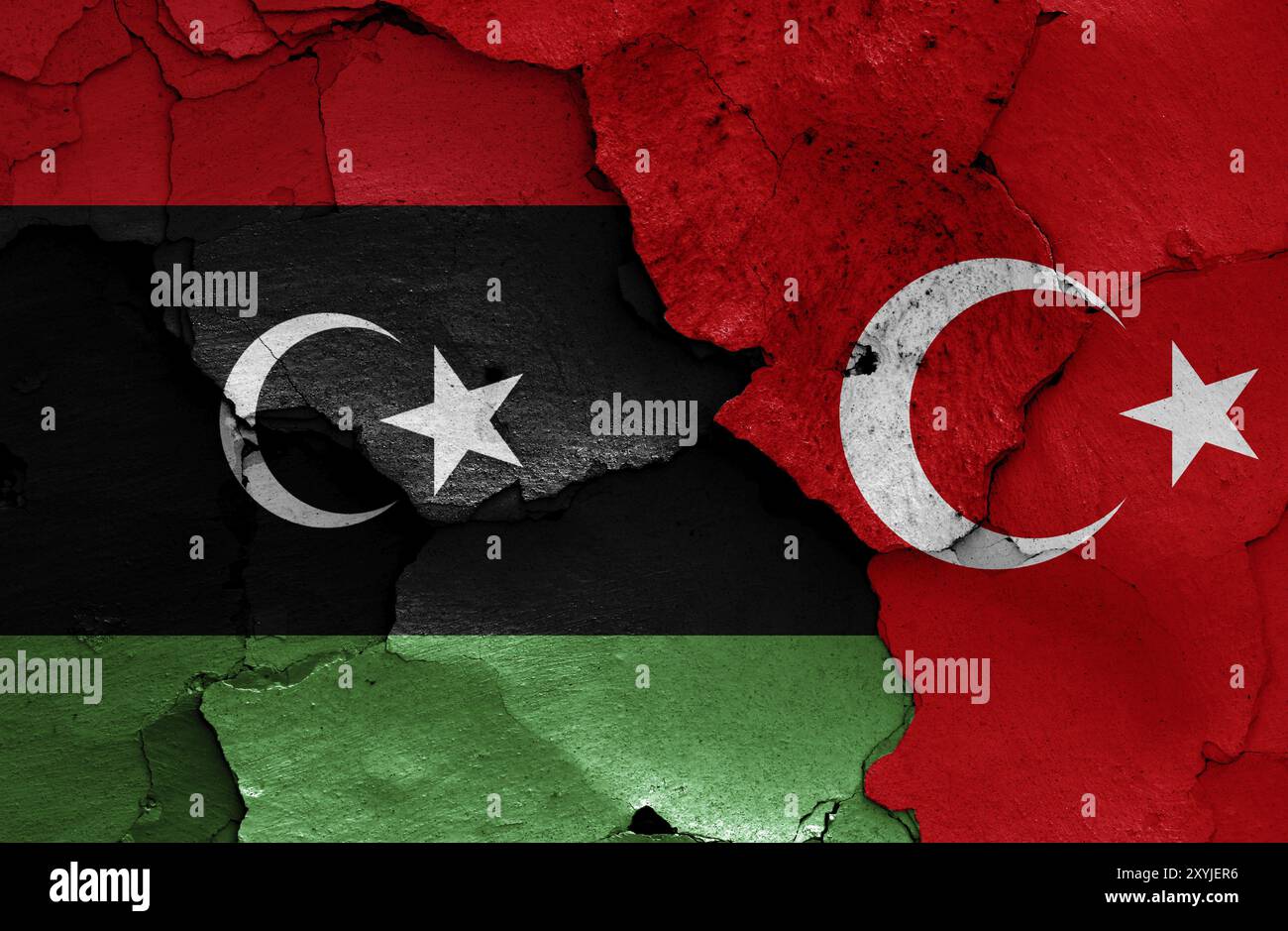Flags of Libya and Turkey painted on cracked wall Stock Photo - Alamy