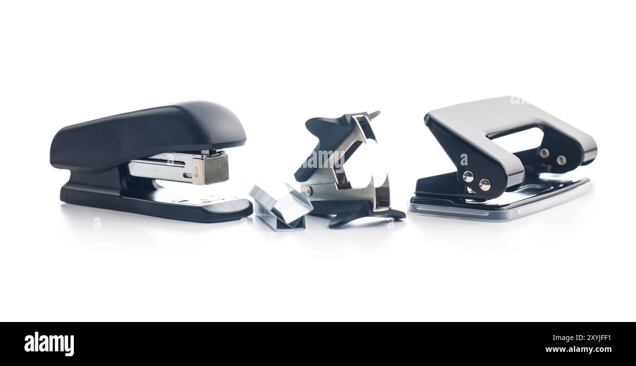 Office equipment. Stapler, staple remover and hole puncher isolated on ...