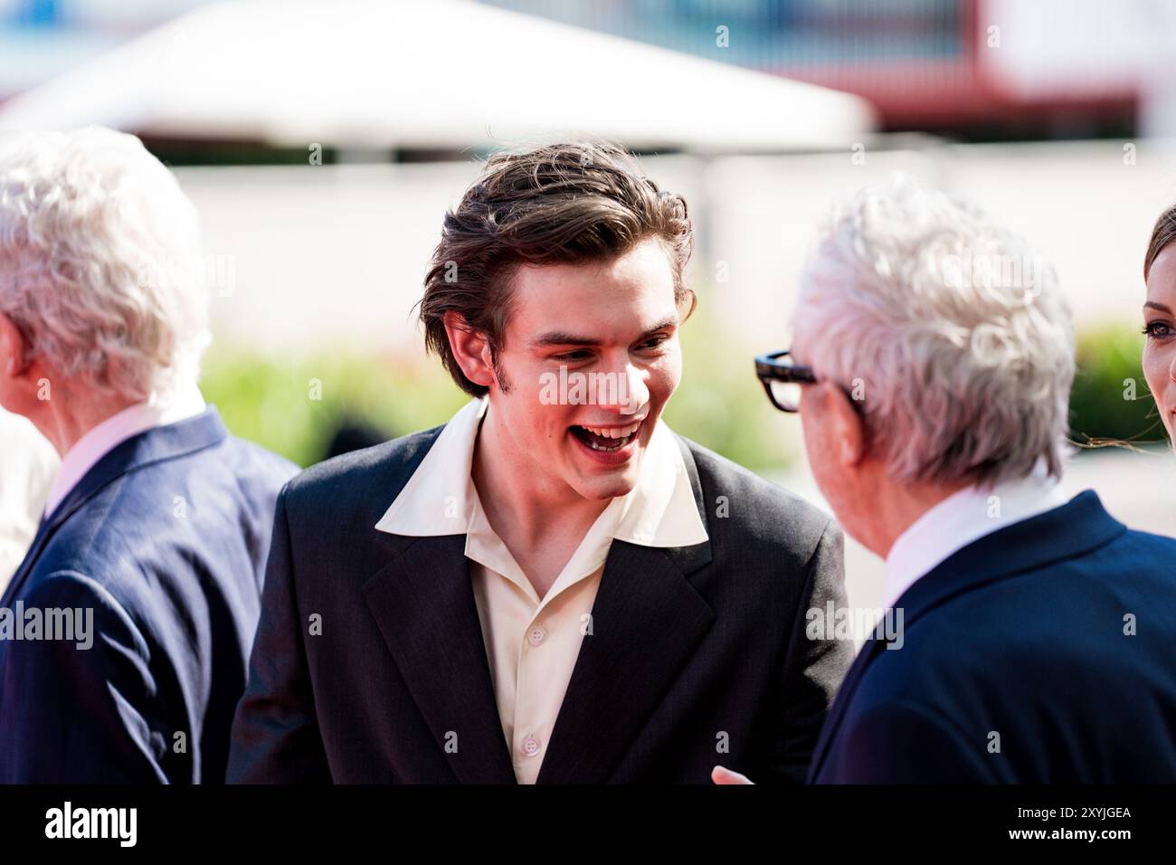 VENICE, ITALY - AUGUST 29 2024 - Louis Partridge attends the red carpet ...