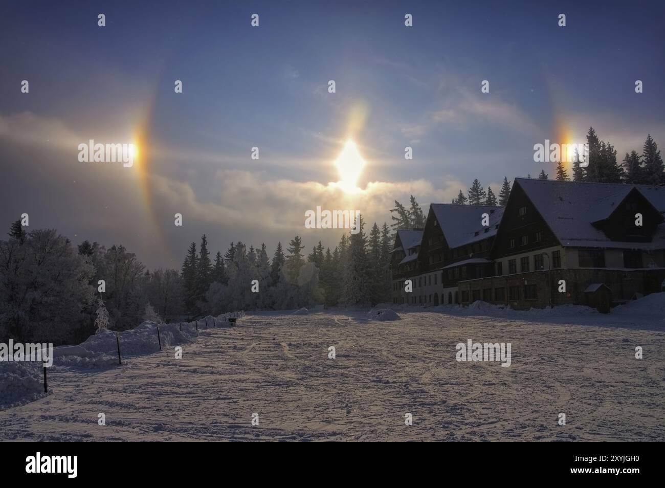 Parhelion suns on a cold winter's day, sun dog, an atmospheric ...
