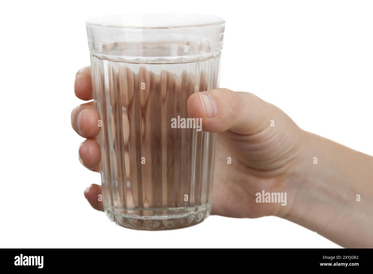 Female human hand holding liquid drink water glass Stock Photo - Alamy