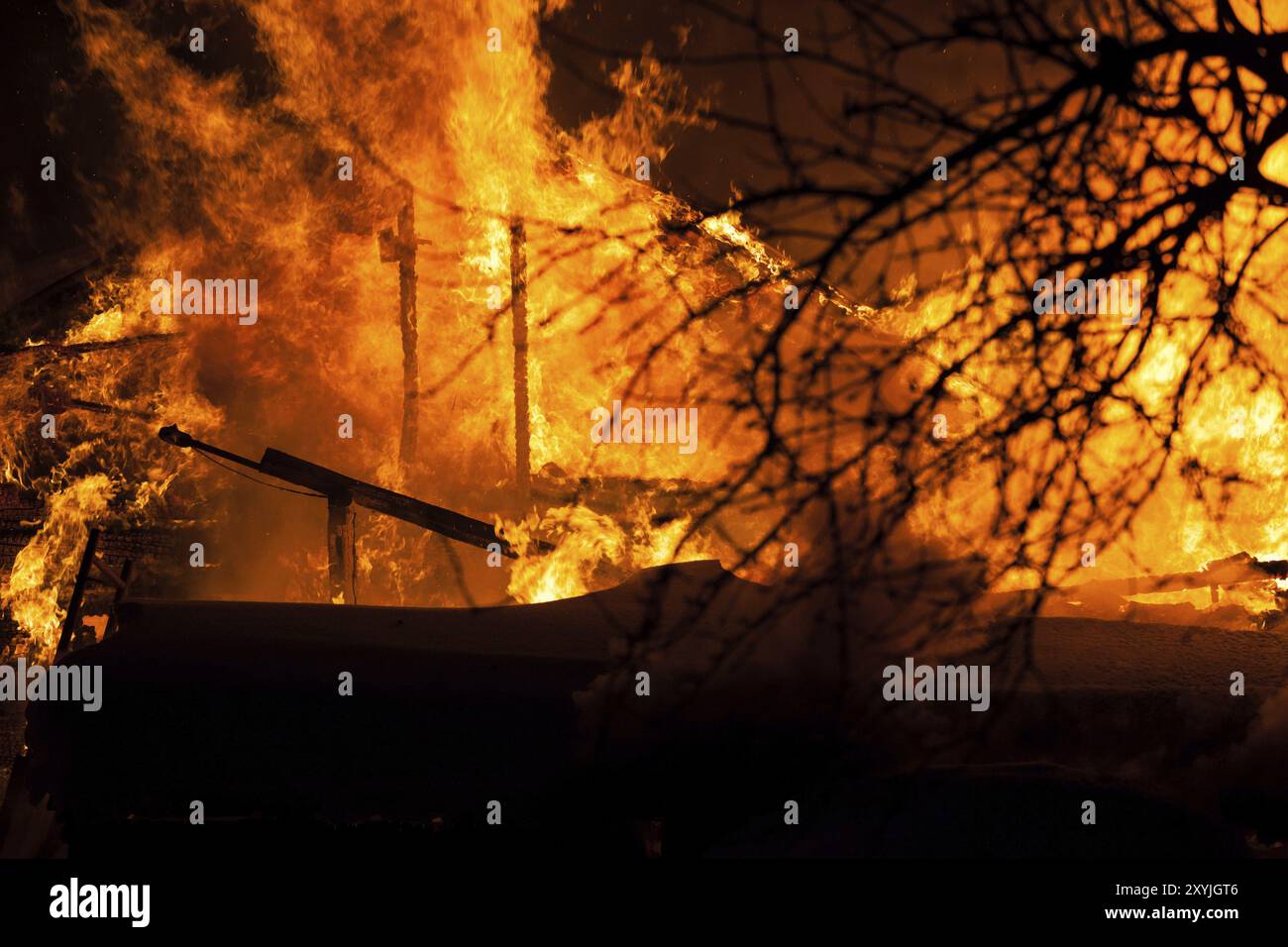Arson or nature disaster, burning fire flame on wooden house roof Stock ...