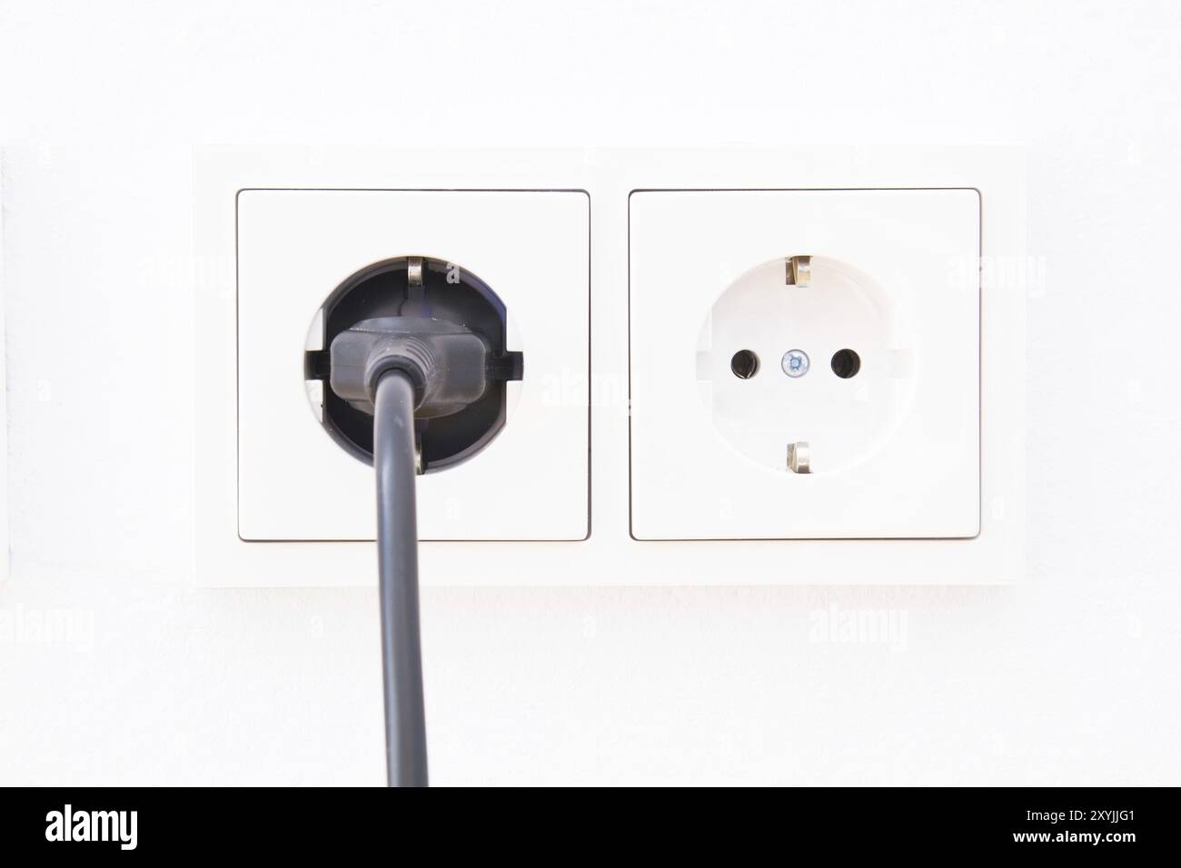 Double socket outlet with white background Stock Photo - Alamy