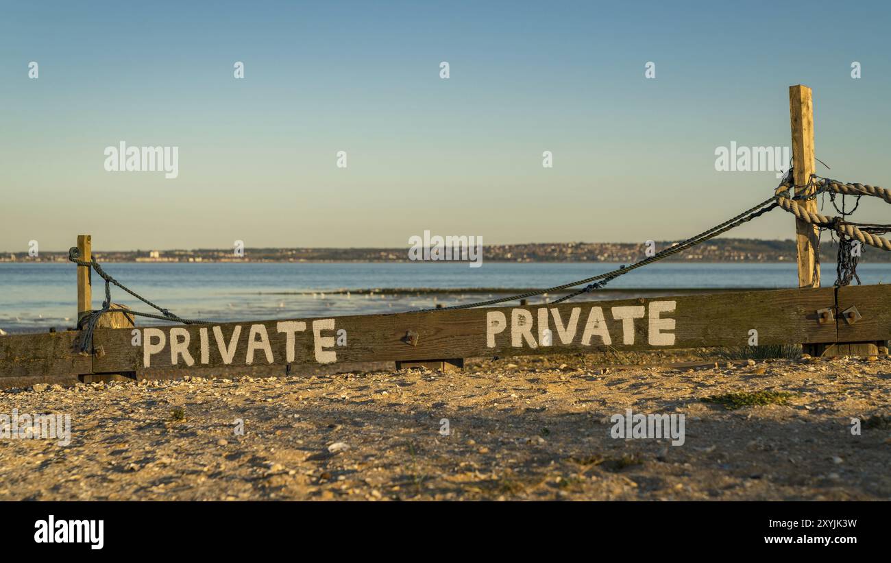 Sign: Private, seen at Shellness Beach on the Isle of Sheppey, Kent ...