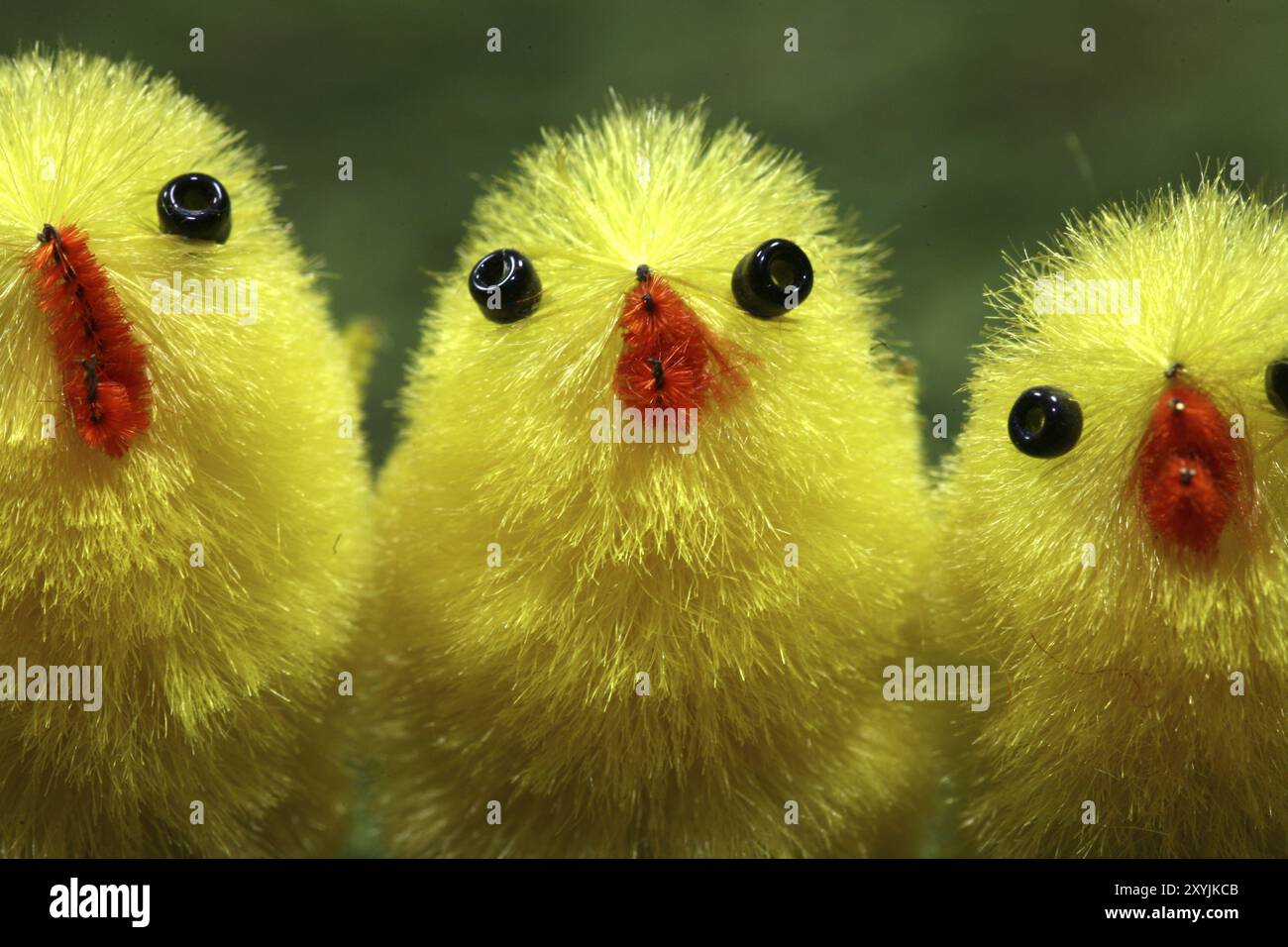 Yellow mini decorative figurines Stock Photo - Alamy