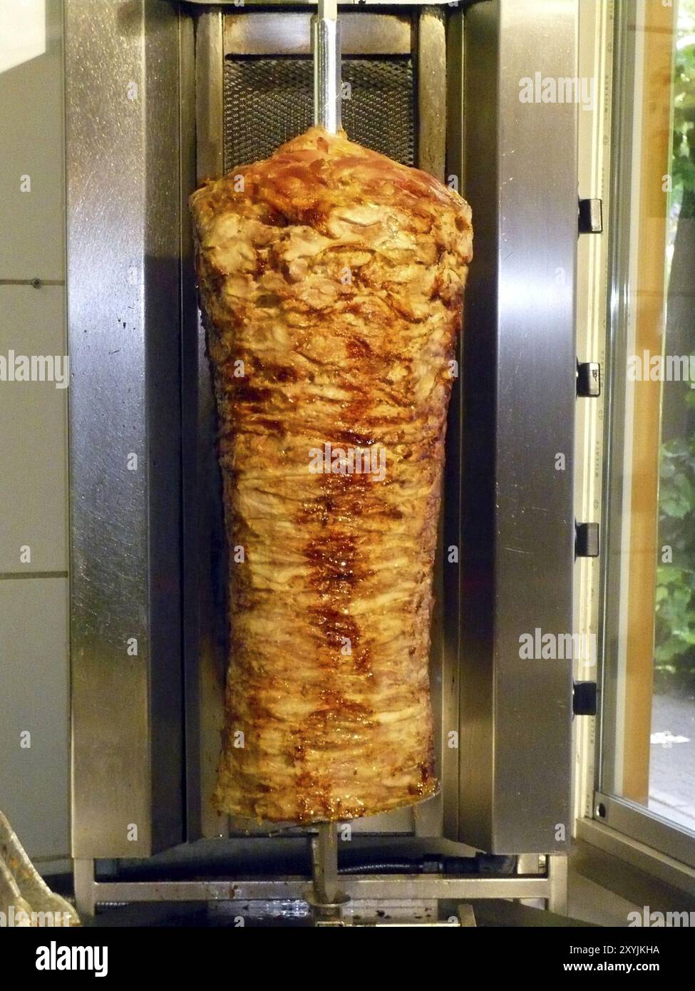 Doner kebab shop with grilled lamb on a spit Stock Photo - Alamy