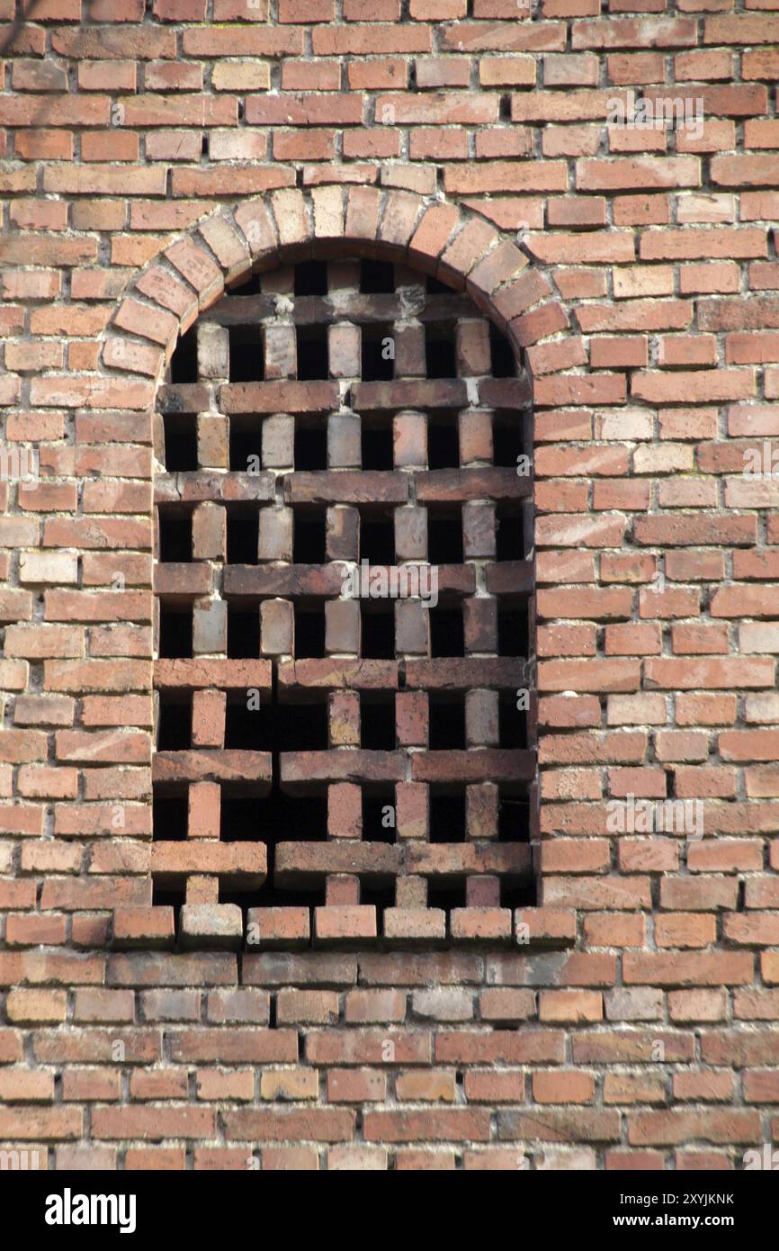 Brick window grille in a barn in Woebbel Stock Photo - Alamy