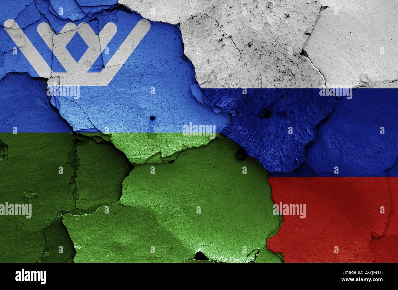 Flags of Khanty-Mansi Autonomous Okrug and Russia painted on cracked ...
