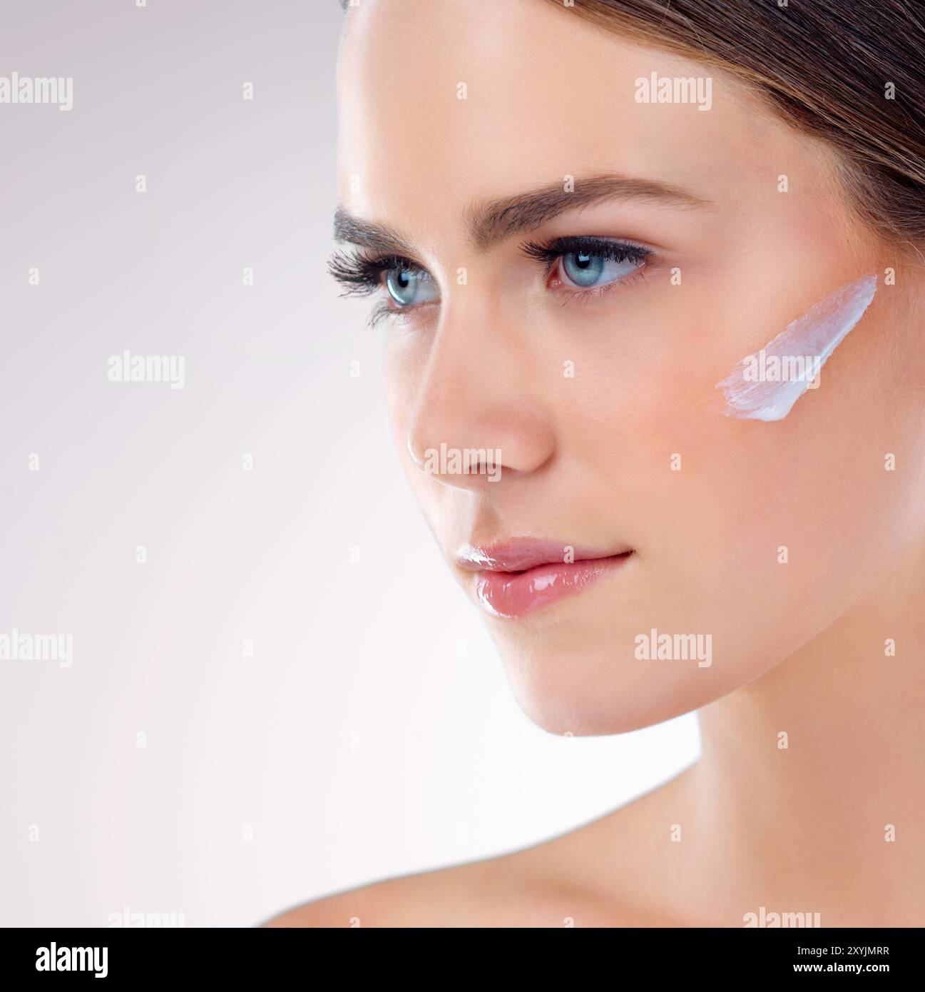 Face cream, thinking or model with skincare in studio on white ...