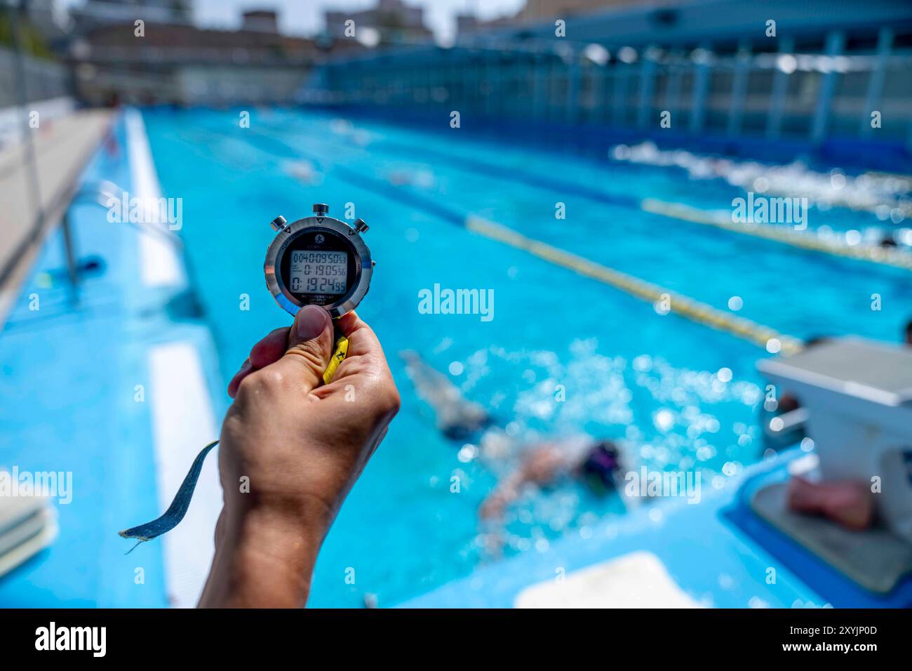 Stopwatch seen at 1000 meters swimming competition by One Team Forces ...
