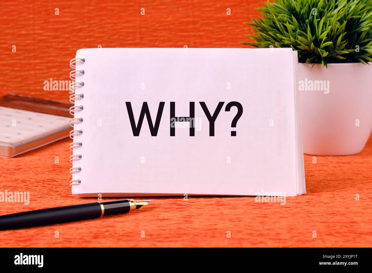 Start with Why Business Motivation Concept. Word WHY on a blank notepad ...
