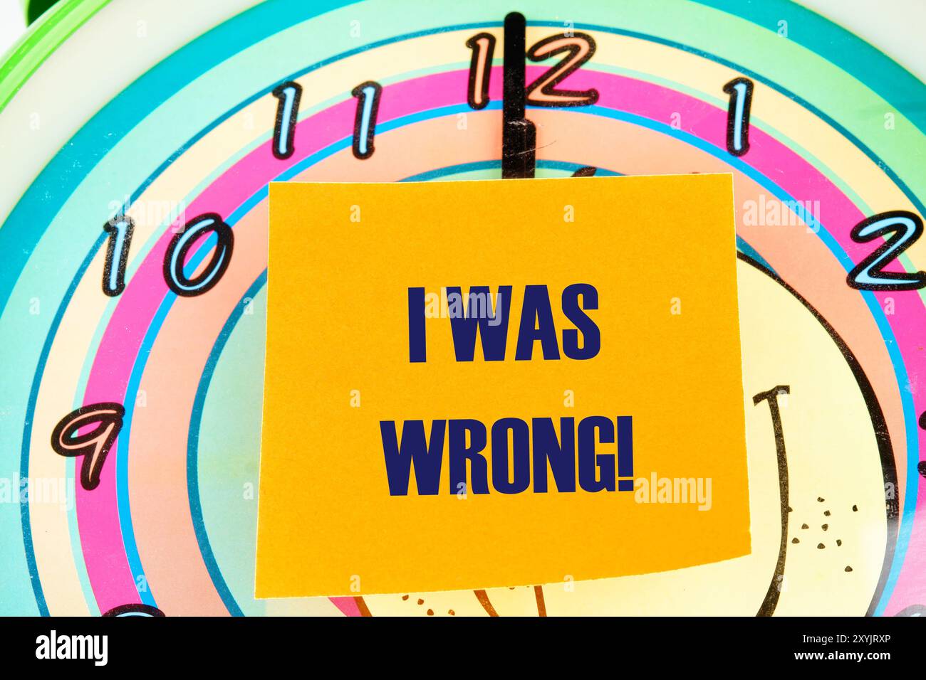 I WAS WRONG text written on the sticker on the background of the clock ...
