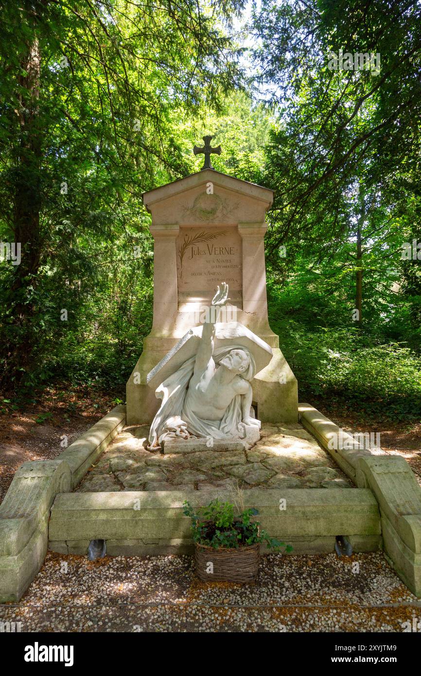 Jules Verne's tomb The sculpture was designed by Albert Roze it depicts a man breaking out of ...