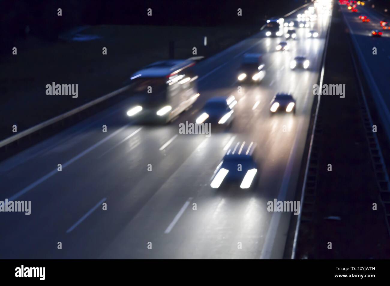 Traffic on the motorway at night Stock Photo - Alamy