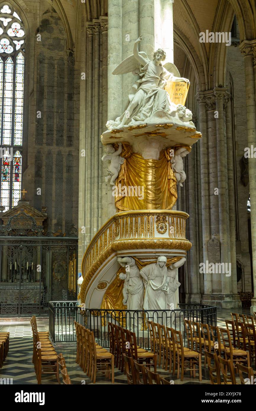 The Baroque pulpit. Made of marble and wood shrouded in gold, the three ...