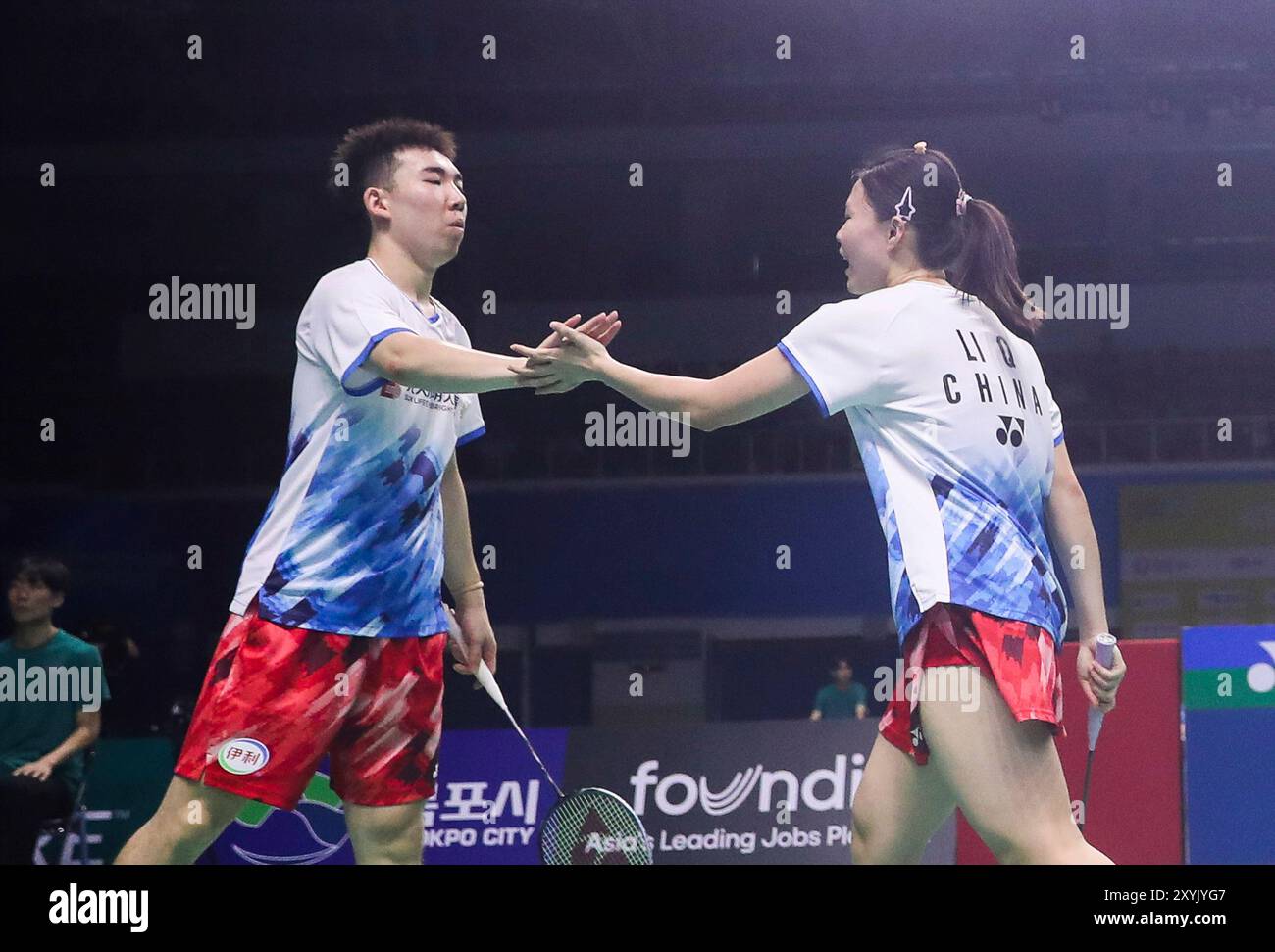Mokpo, South Korea. 30th Aug, 2024. Guo Xinwa (L)/Li Qian of China react during the mixed ...