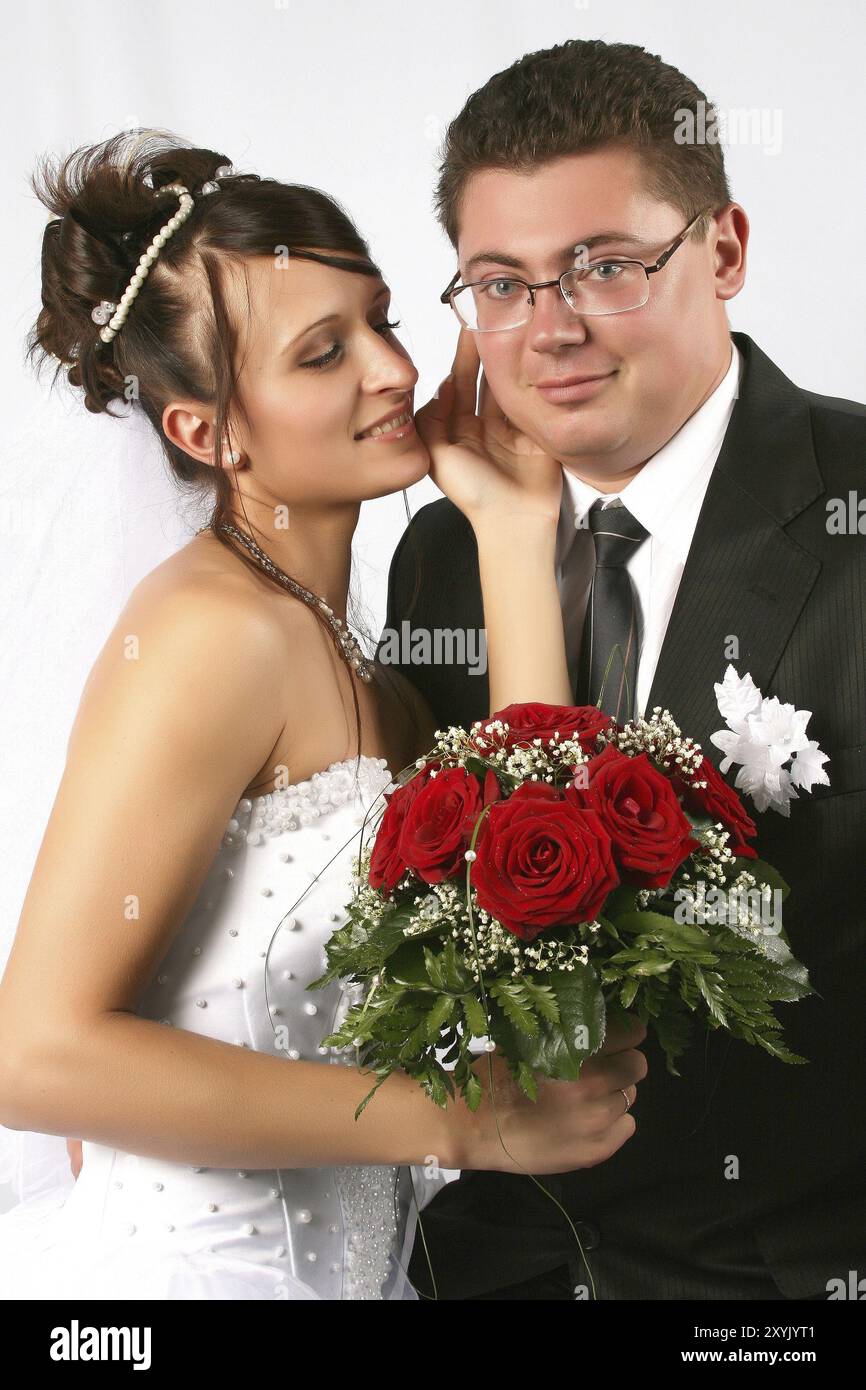 Newly married together in a photo pose Stock Photo - Alamy