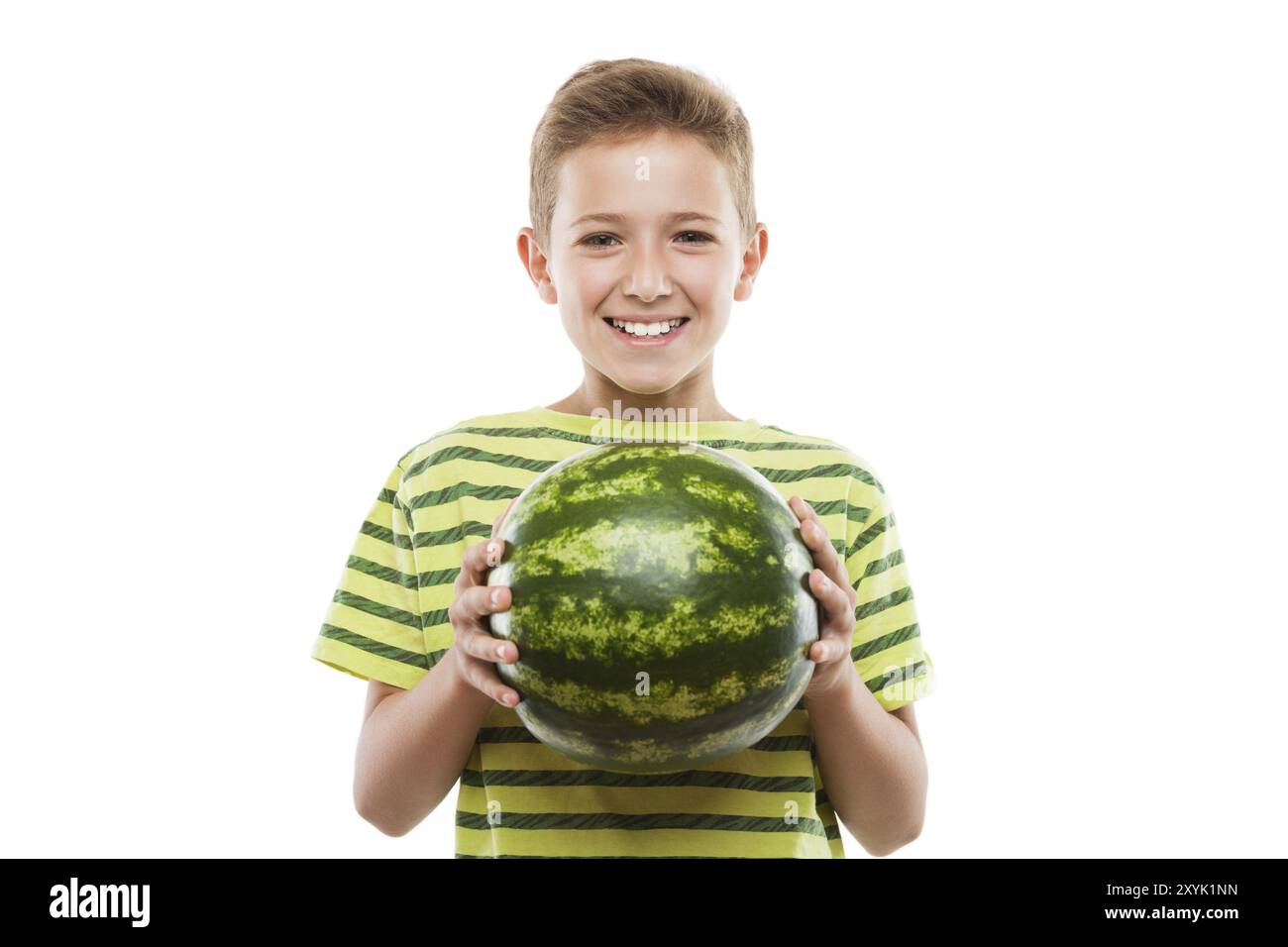 Handsome smiling child boy hand holding green ripe watermelon fruit ...