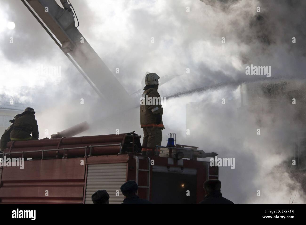 Burning fire smoke firefighter emergency service Stock Photo - Alamy