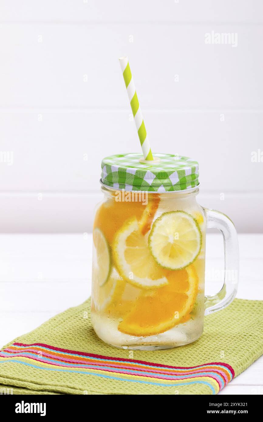 Detox fruit infused flavored water. Refreshing summer homemade cocktail ...