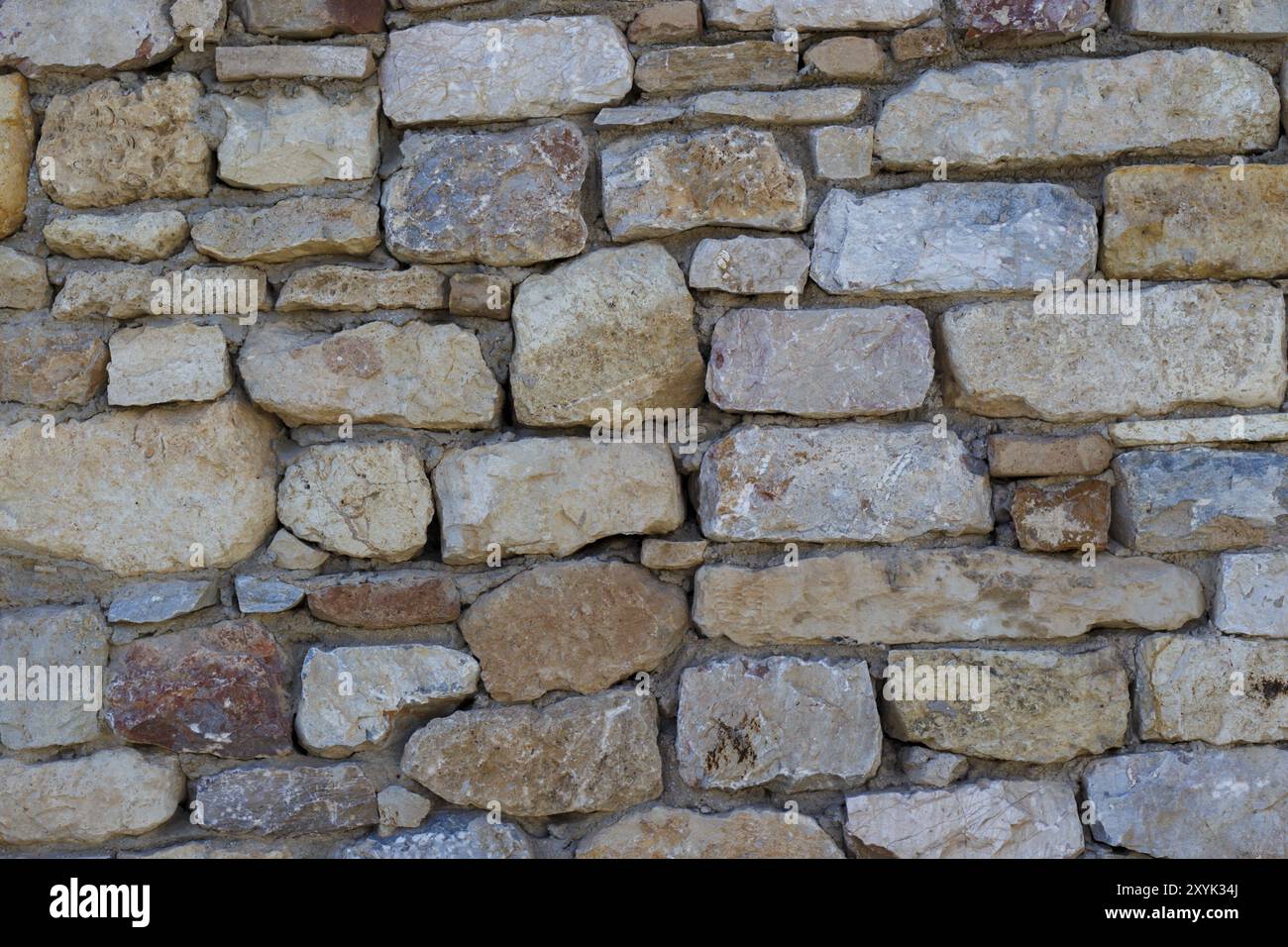 Natural stone wall texture, old streets of greece Stock Photo - Alamy