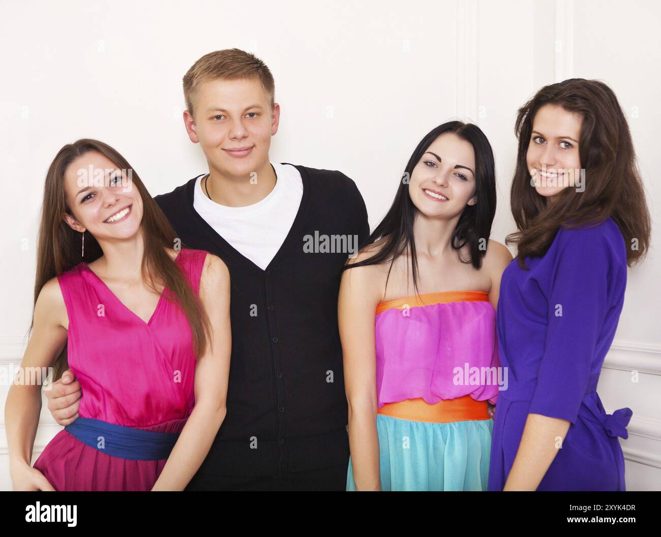 Four happy teen friends having fun together Stock Photo - Alamy