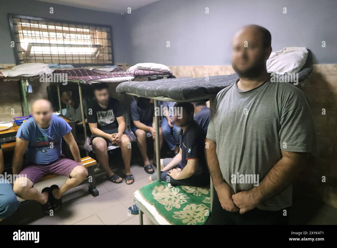 SUMY REGION, UKRAINE - AUGUST 28, 2024 - Captive Russian POWs sit on ...