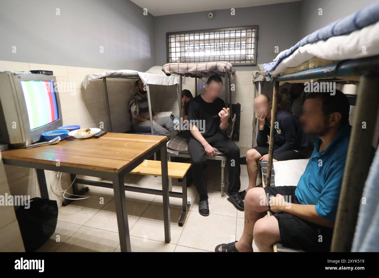 SUMY REGION, UKRAINE - AUGUST 28, 2024 - Captive Russian POWs sit on ...