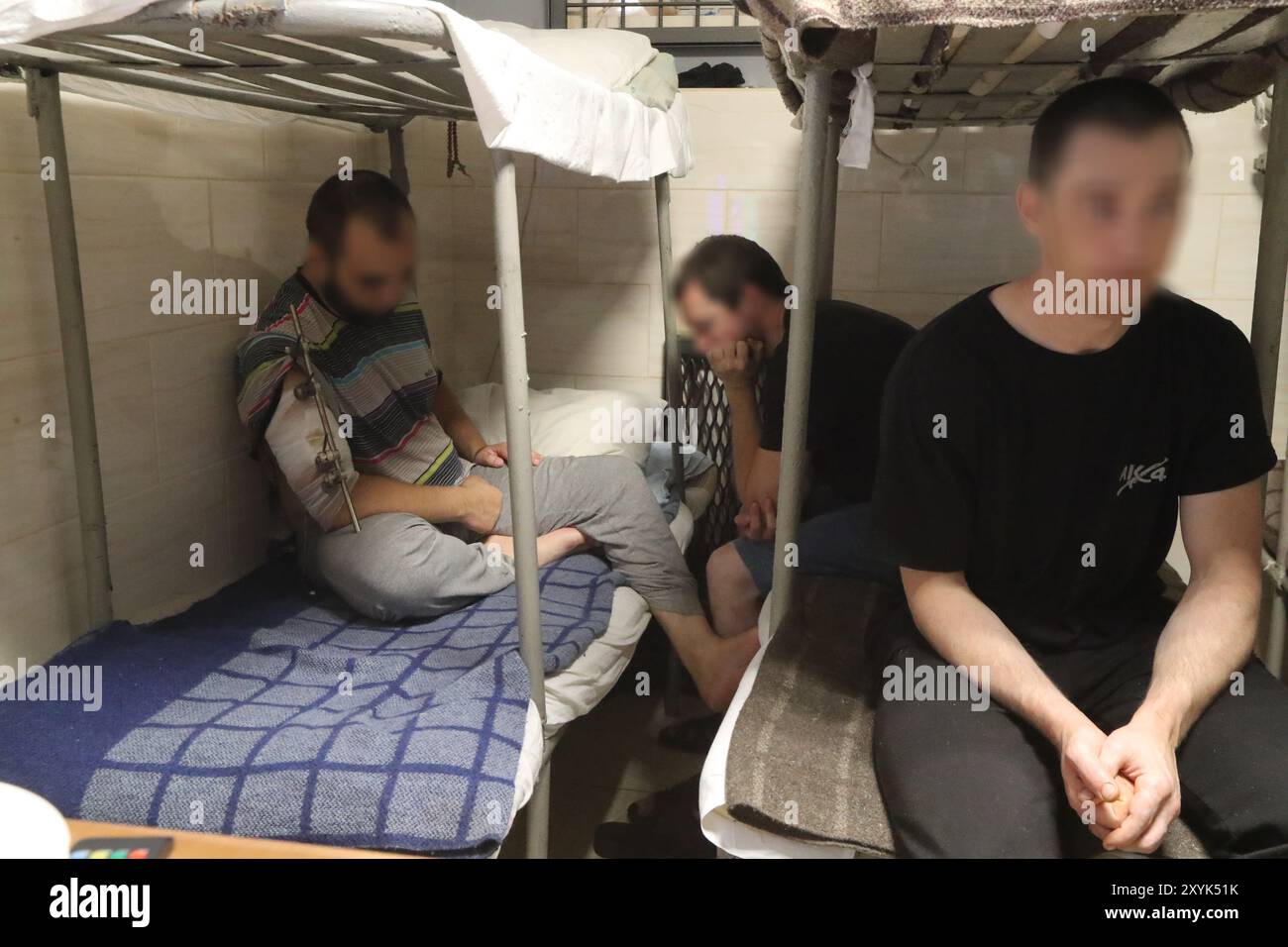 SUMY REGION, UKRAINE - AUGUST 28, 2024 - Captive Russian POWs sit on ...