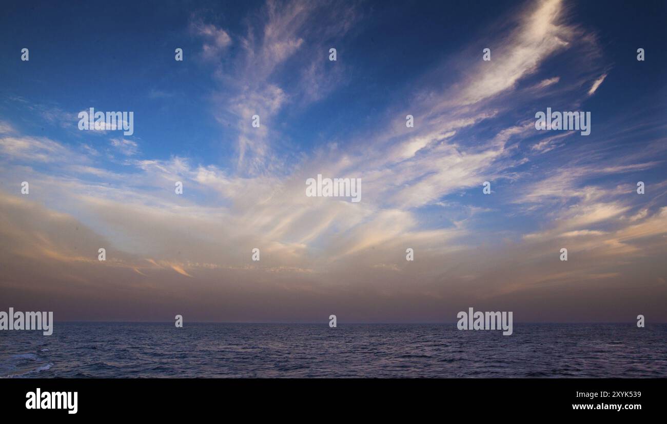 Wispy sky and the ocean hi-res stock photography and images - Alamy