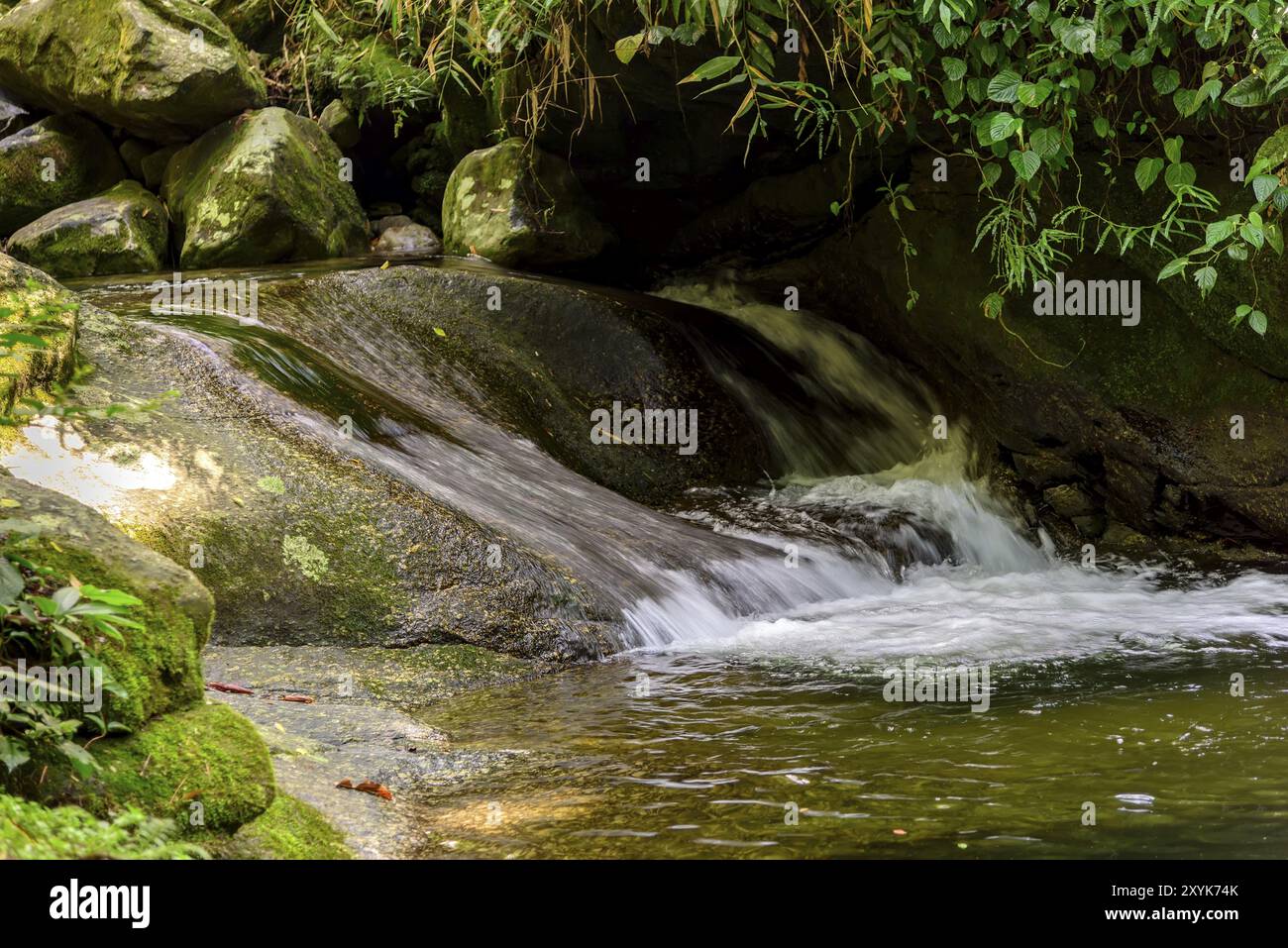 Small river and waterfall between the Itatiaia National Park rocks in ...
