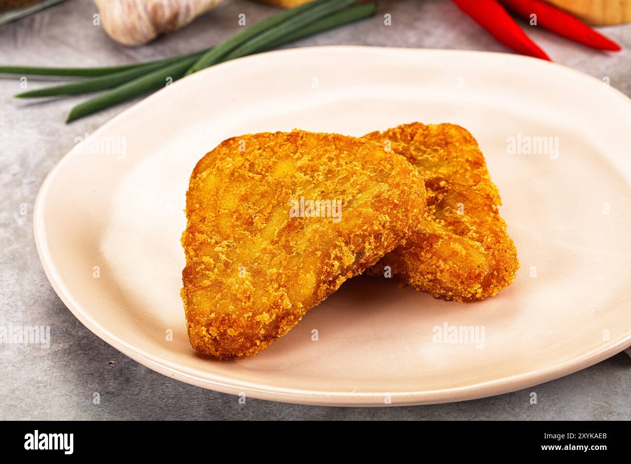 Fried potato hash brown snack for breakfast Stock Photo - Alamy