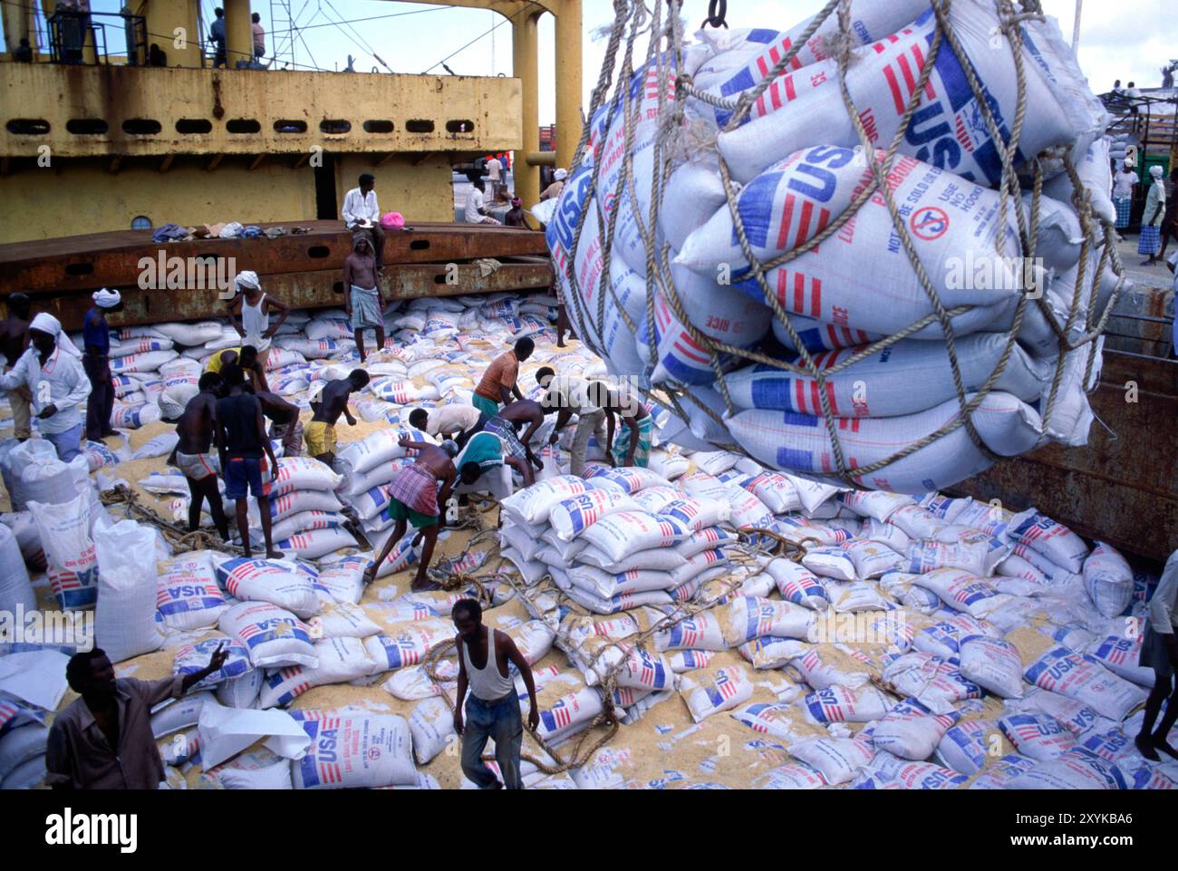 Rice being unloaded from a ship at port, Somalia Stock Photo - Alamy